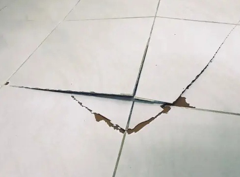 The Pop-Up Problem: Dislodged & Popping Tiles (Why They Buckle and How ...